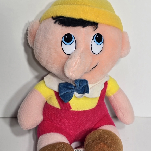 Disney | Toys | Disney Yellow And Red Pinocchio Stuffed Animal | Poshmark
